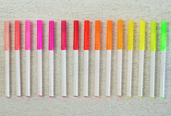 Multi colored felt tip pens in a row - Royalty-free Stock Photo | Dissolve