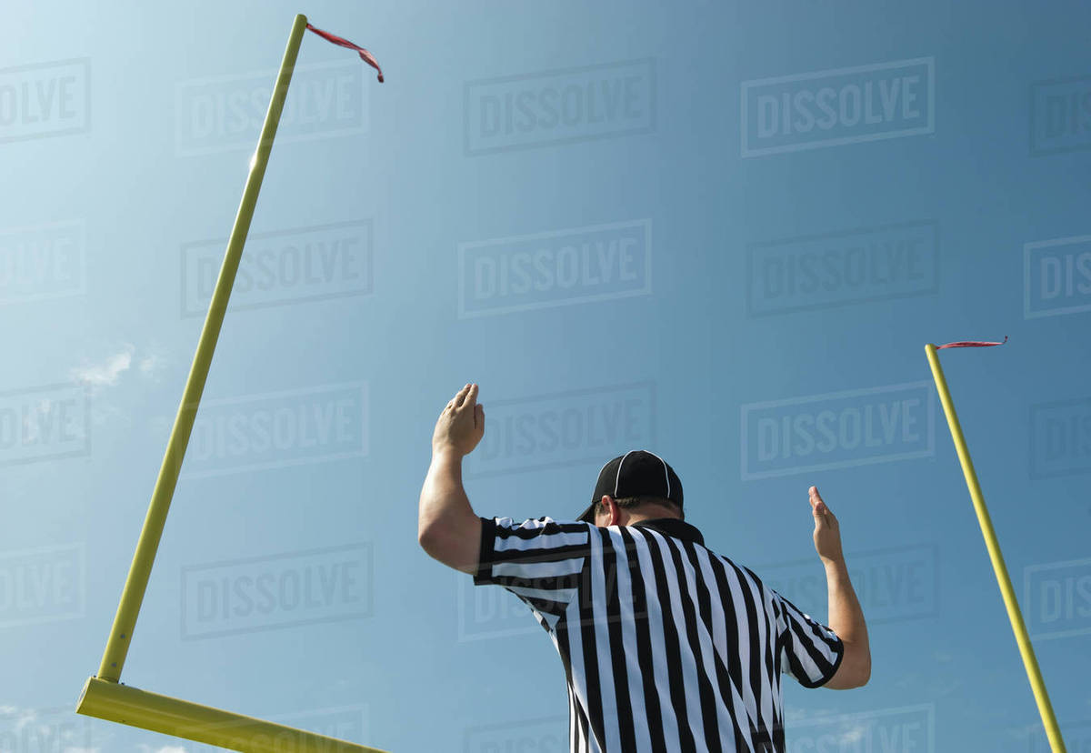 Football referee calling field goal - Royalty-free Stock Photo | Dissolve