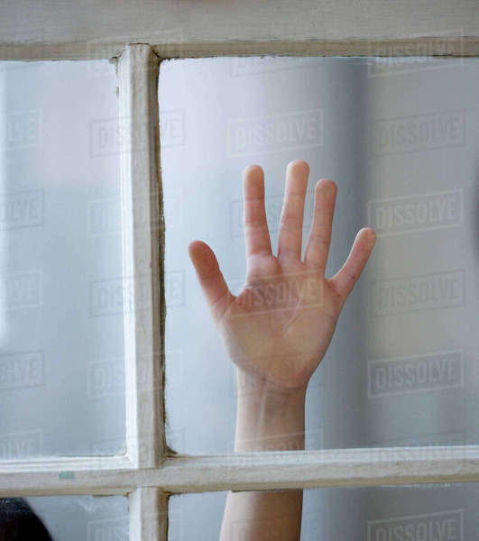 Child's hand on window - Royalty-free Stock Photo | Dissolve