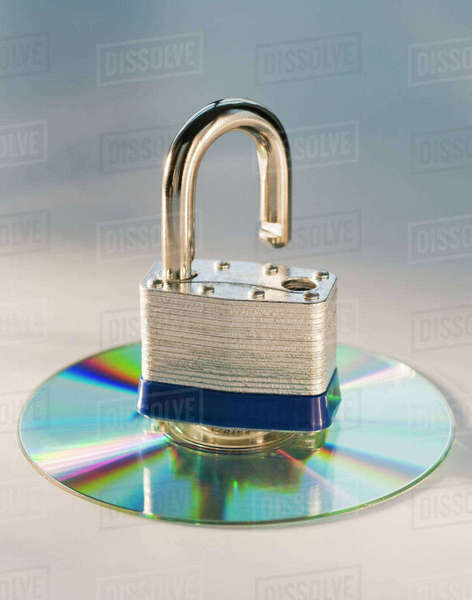 Lock and compact disc - Stock Photo - Dissolve
