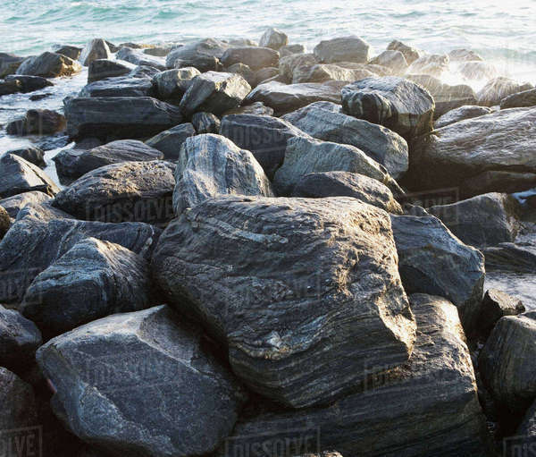Rocks in front of water - Royalty-free Stock Photo | Dissolve