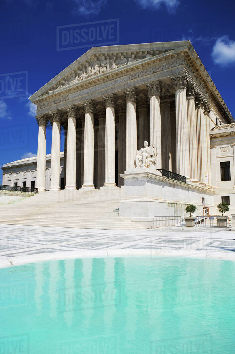 Columned building and reflecting pool, Washington DC, United States ...