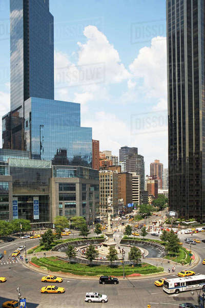 Traffic roundabout in busy urban setting - Royalty-free Stock Photo ...