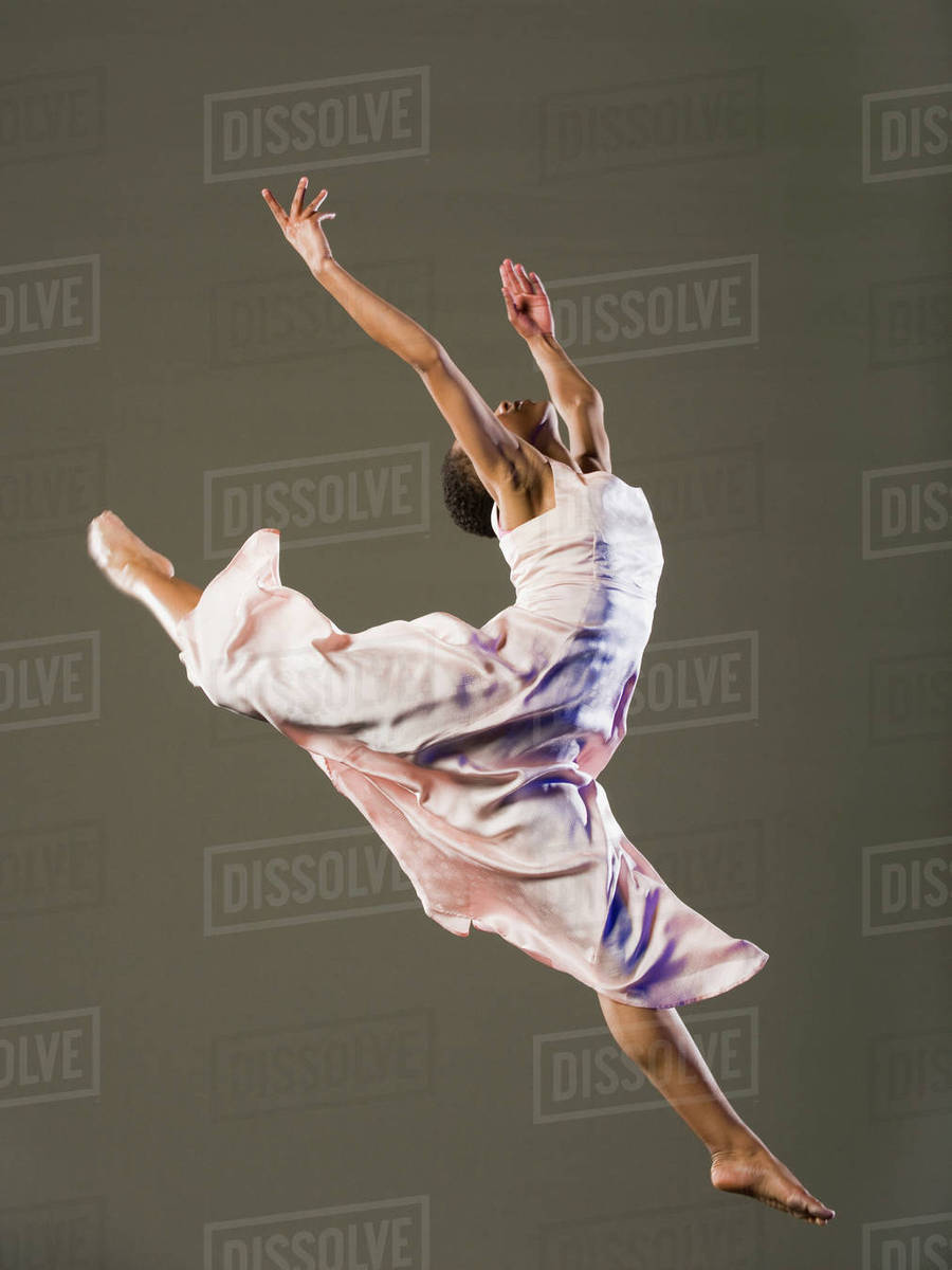 African female ballet dancer jumping - Royalty-free Stock Photo | Dissolve