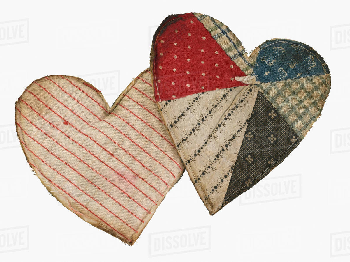 Studio shot of patchwork hearts - Stock Photo - Dissolve