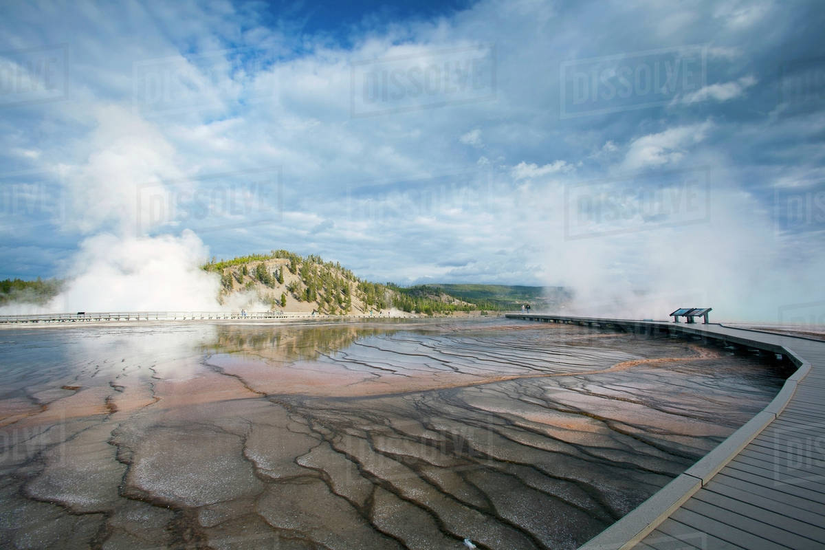 Erupting Grand Prismatic geyser - Stock Photo - Dissolve