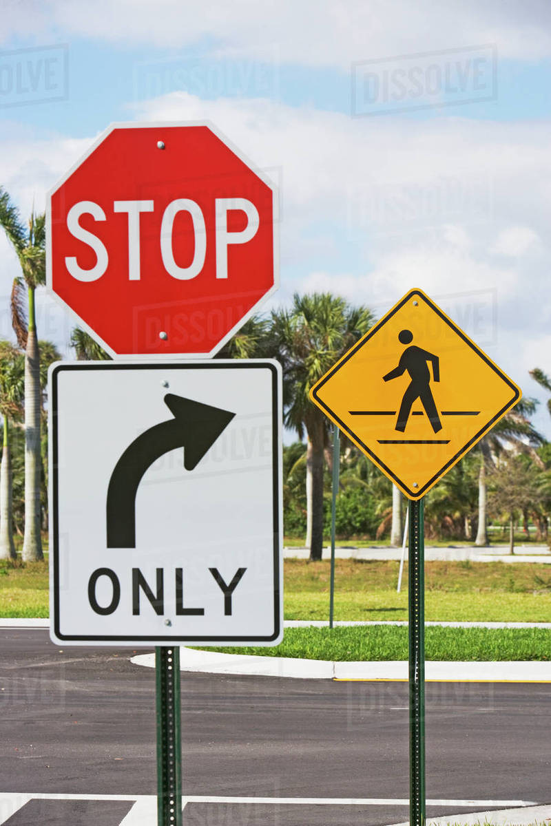 Street signs at intersection - Stock Photo - Dissolve