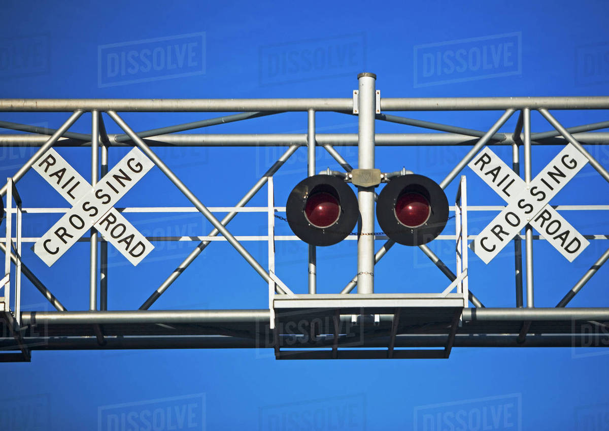 Railroad crossing sign and lights - Royalty-free Stock Photo | Dissolve