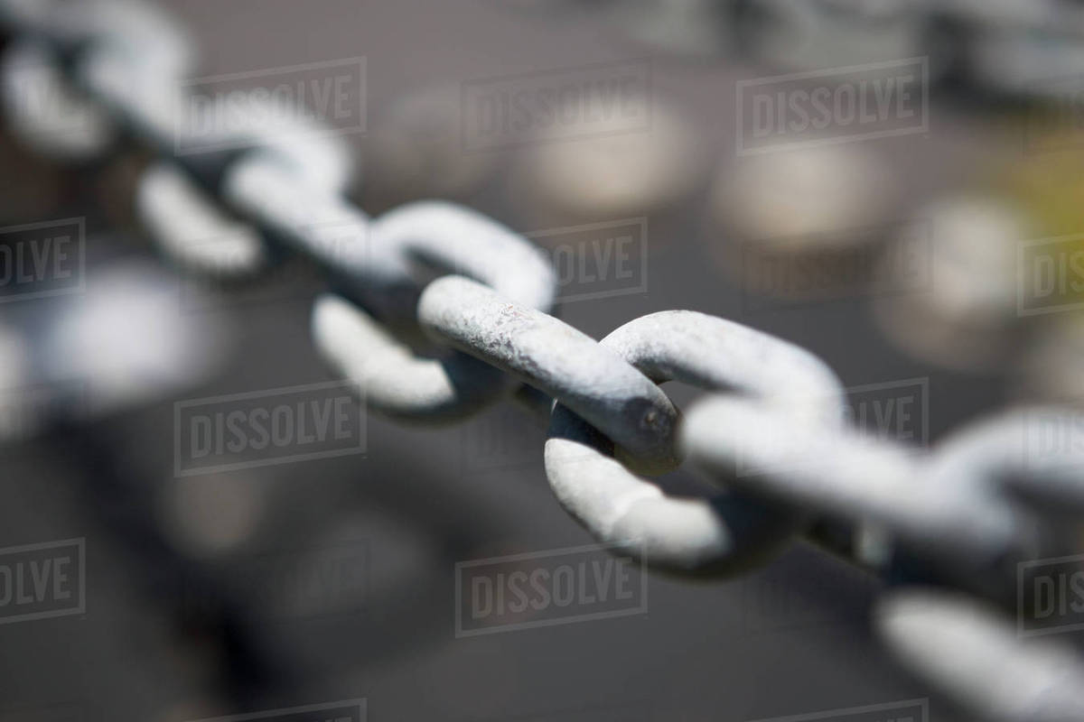 Close up of metal chain - Stock Photo - Dissolve