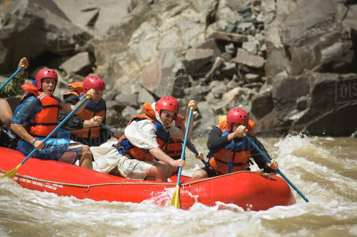 Group of people river rafting - Royalty-free Stock Photo | Dissolve