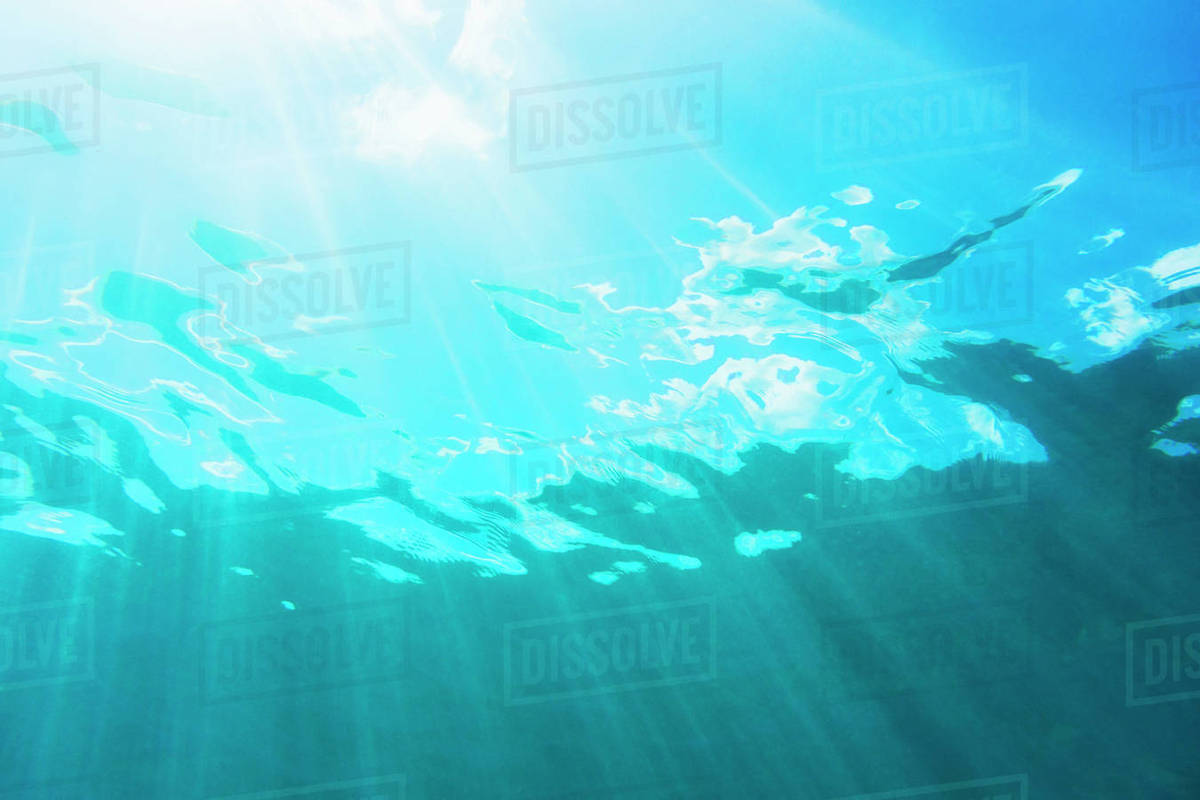 Sunbeam shining underwater - Royalty-free Stock Photo | Dissolve
