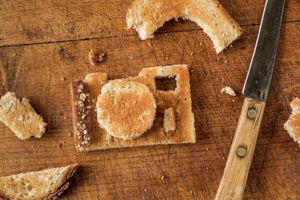 Camera shaped toast bread on cutting board - Stock Photo - Dissolve