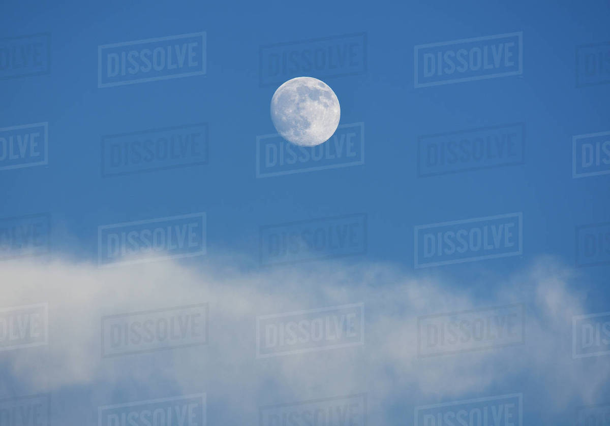 Full moon on blue sky - Royalty-free Stock Photo | Dissolve