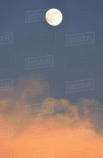 Full moon at dusk - Royalty-free Stock Photo | Dissolve