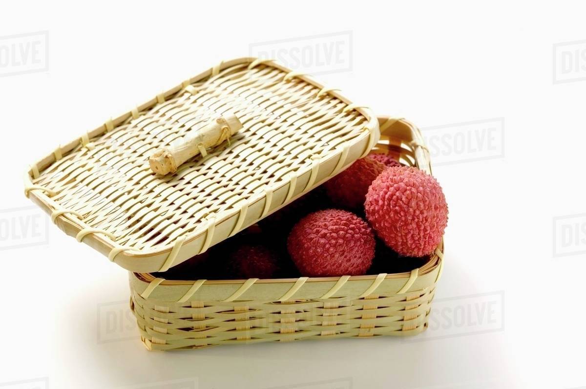 Lychees in basket - Royalty-free Stock Photo | Dissolve