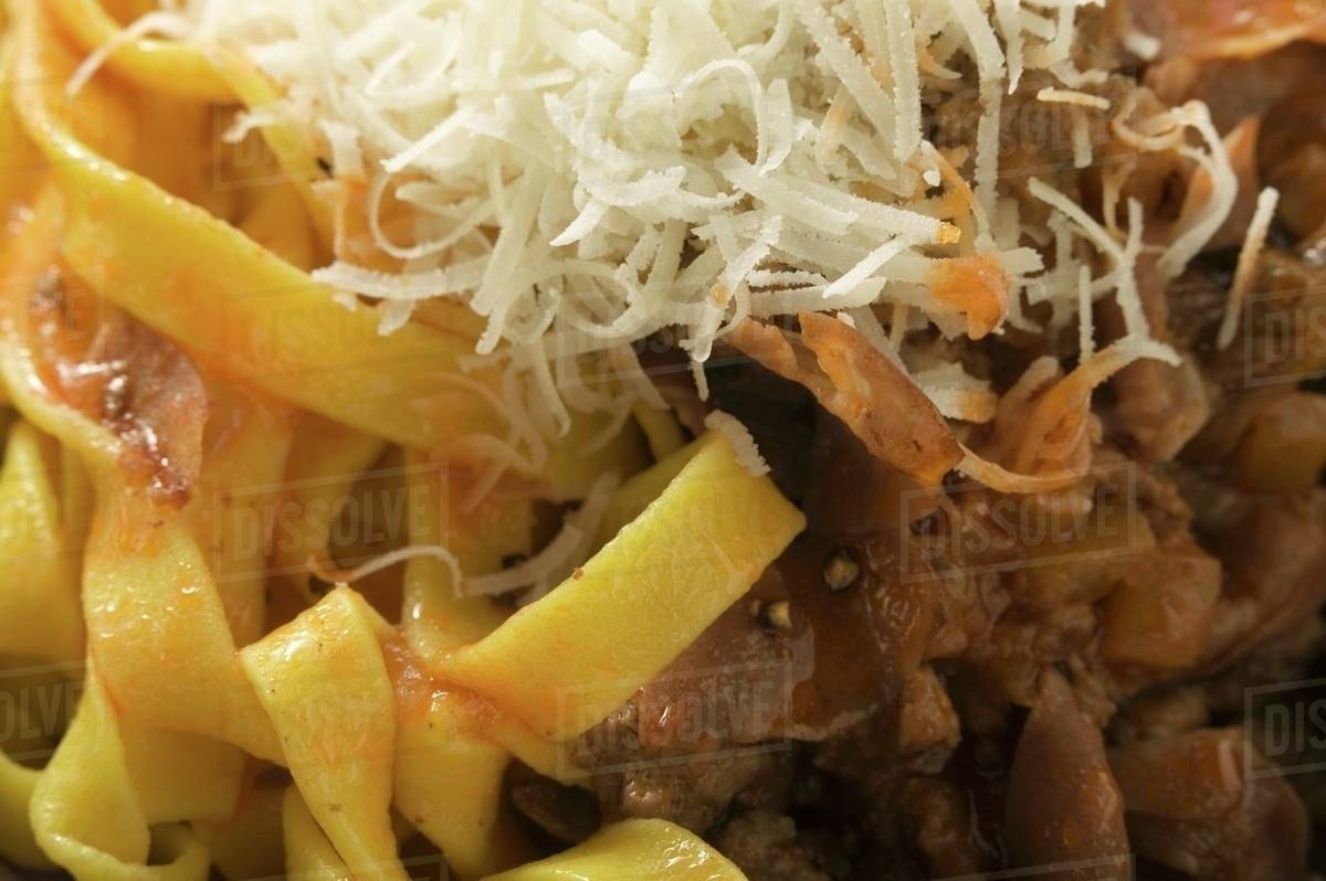 Saffron ribbon pasta with mince ragout (close-up) - Royalty-free Stock ...