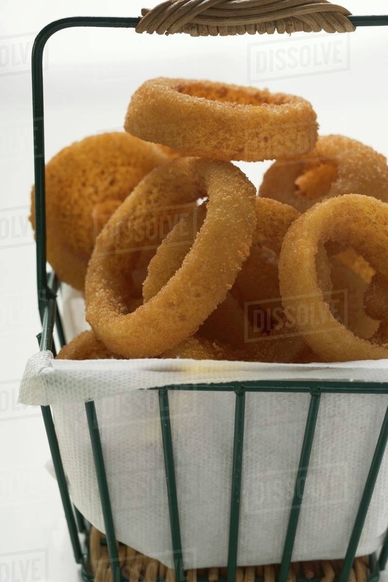 Deep-fried onion rings in a wire basket - Royalty-free Stock Photo ...
