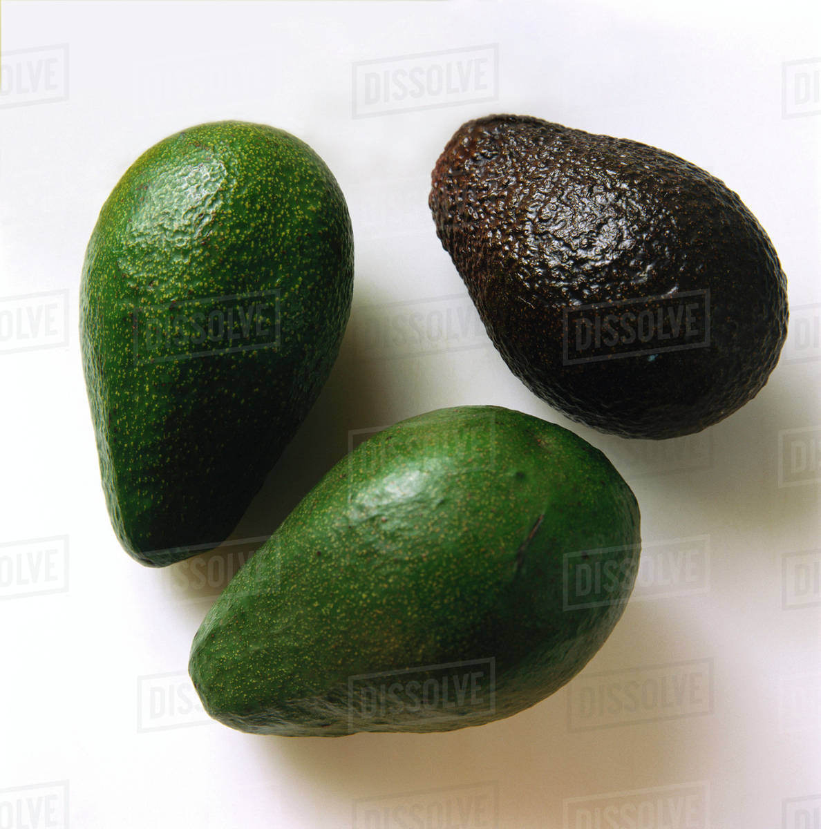 Three Assorted Avocados - Royalty-free Stock Photo | Dissolve