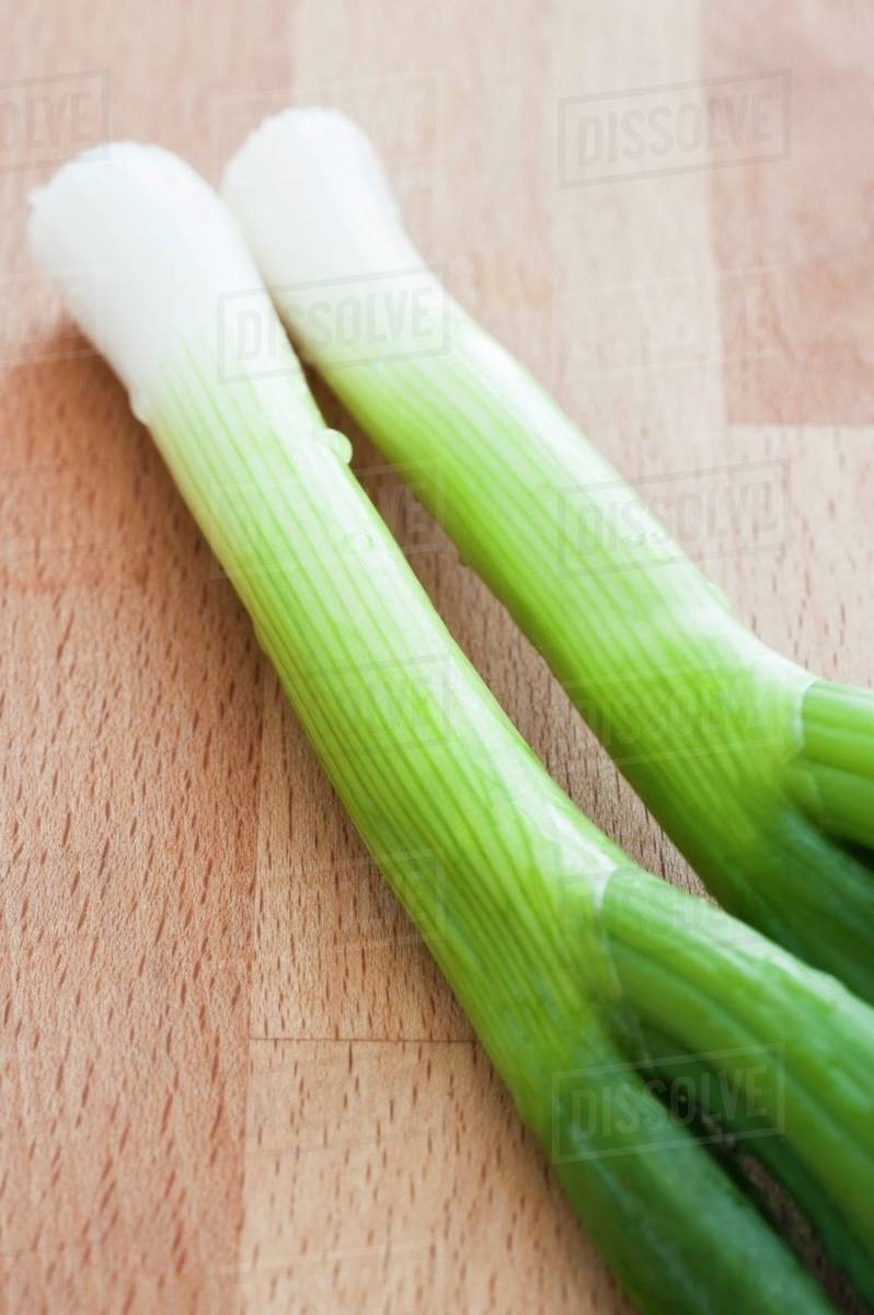 Two spring onions - Stock Photo - Dissolve