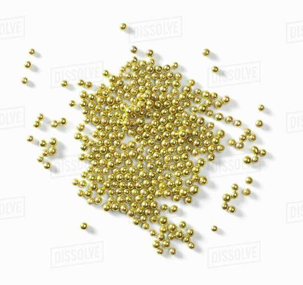 Lots of gold pearls - Stock Photo - Dissolve