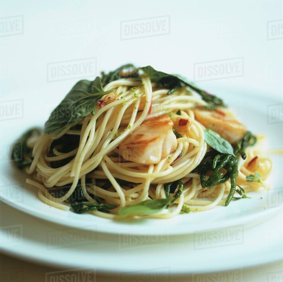 Spaghetti with scallops and rock samphire - Stock Photo - Dissolve