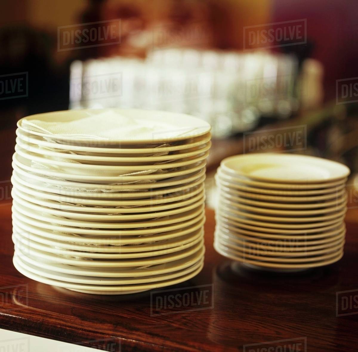 Two piles of plates - Royalty-free Stock Photo | Dissolve