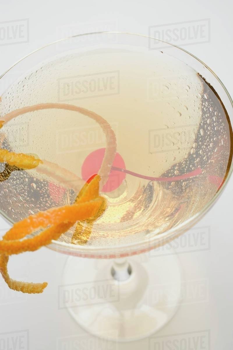 Manhattan with cocktail cherry and orange zest - Royalty-free Stock ...