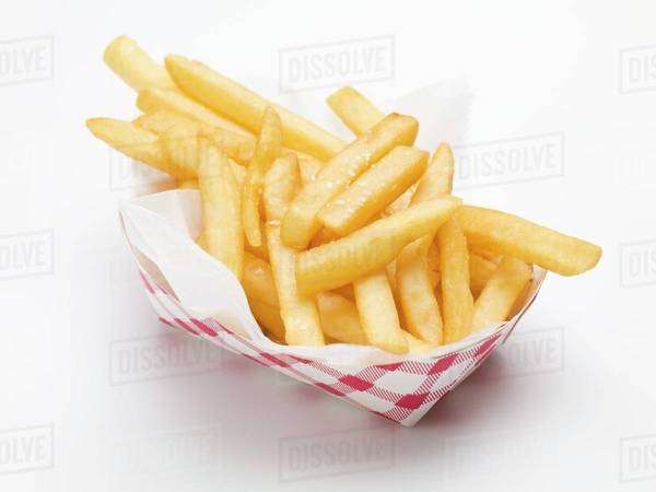 A portion of chips in a paper dish (fast food) - Stock Photo - Dissolve