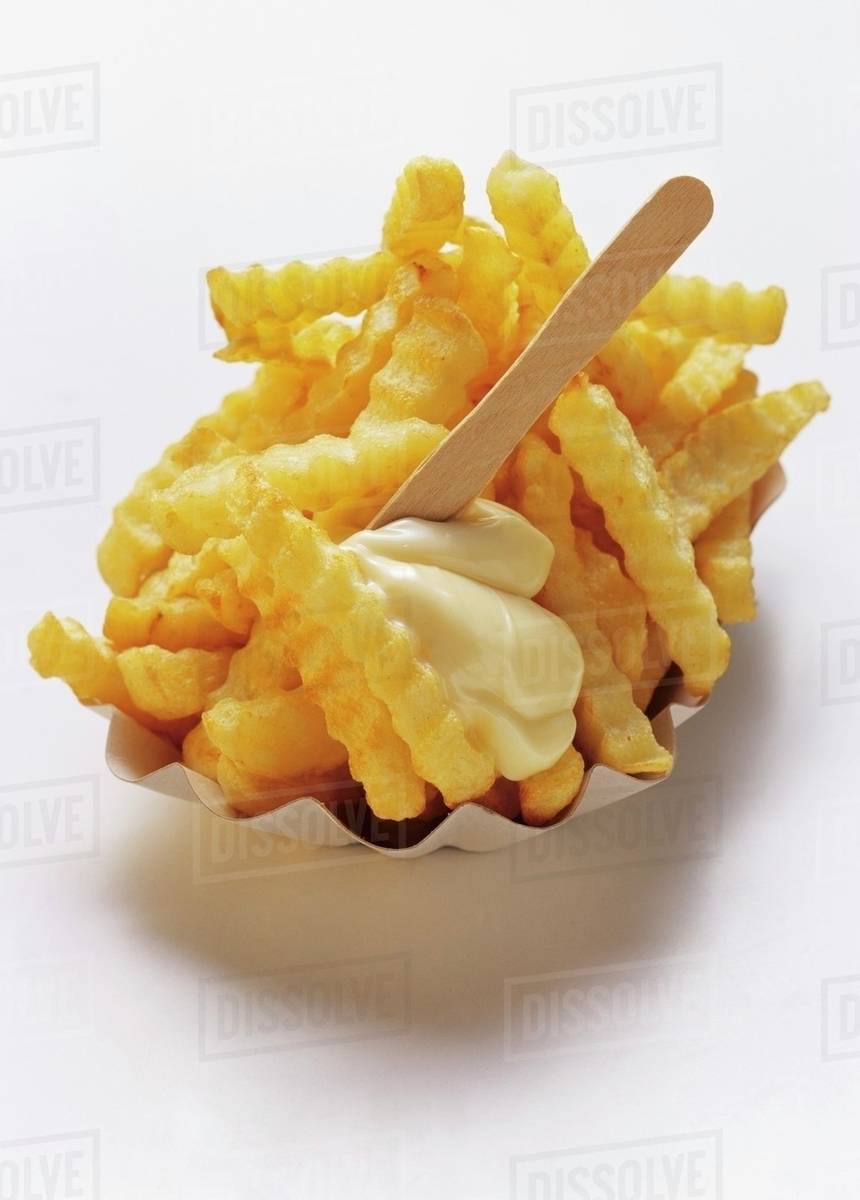 Crinkle Cut French Fries in a Carton with Mayonnaise - Royalty-free ...
