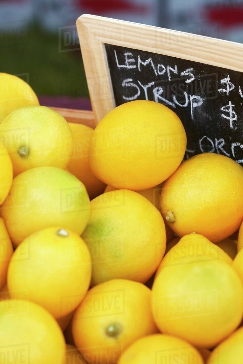 Organic Lemons at Market - Royalty-free Stock Photo | Dissolve
