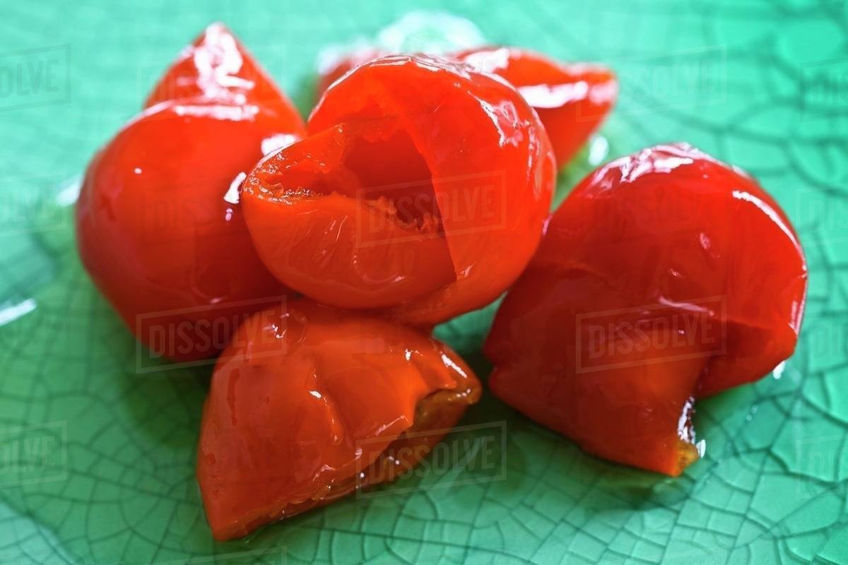 Pickled red chillies - Stock Photo - Dissolve