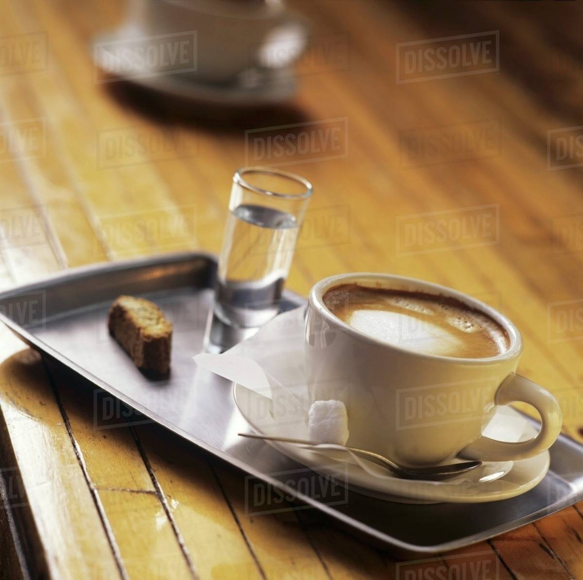 Cappuccino and grappa on tray - Royalty-free Stock Photo | Dissolve