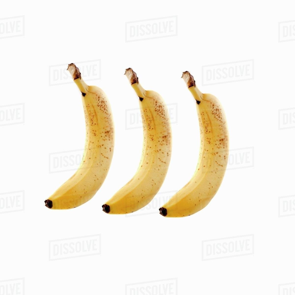 Three ripe bananas - Royalty-free Stock Photo | Dissolve