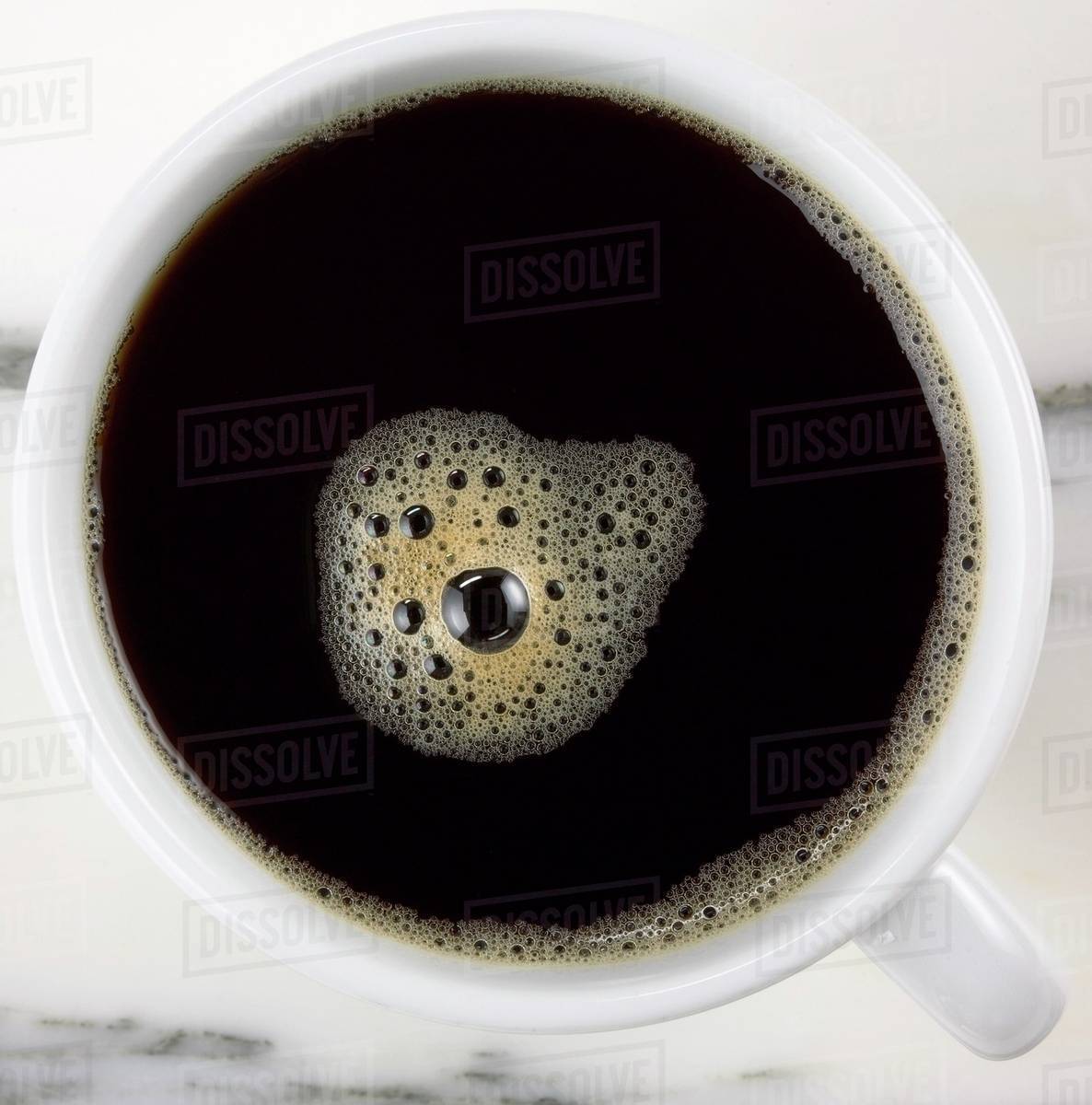 A cup of black coffee (from above) - Royalty-free Stock Photo | Dissolve