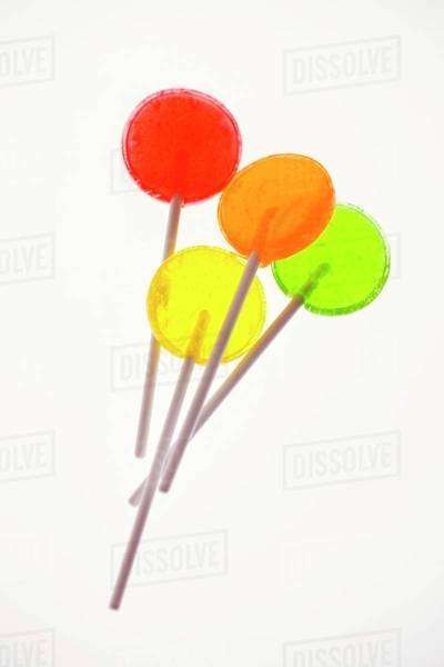 Four coloured lollipops - Royalty-free Stock Photo | Dissolve