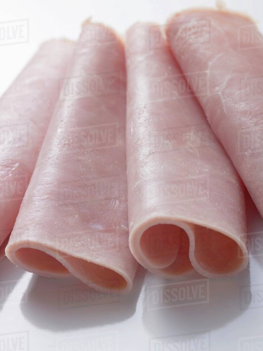 Rolls of ham (detail) - Royalty-free Stock Photo | Dissolve