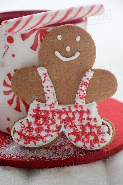Gingerbread man, candy cane and festive cup - Stock Photo - Dissolve
