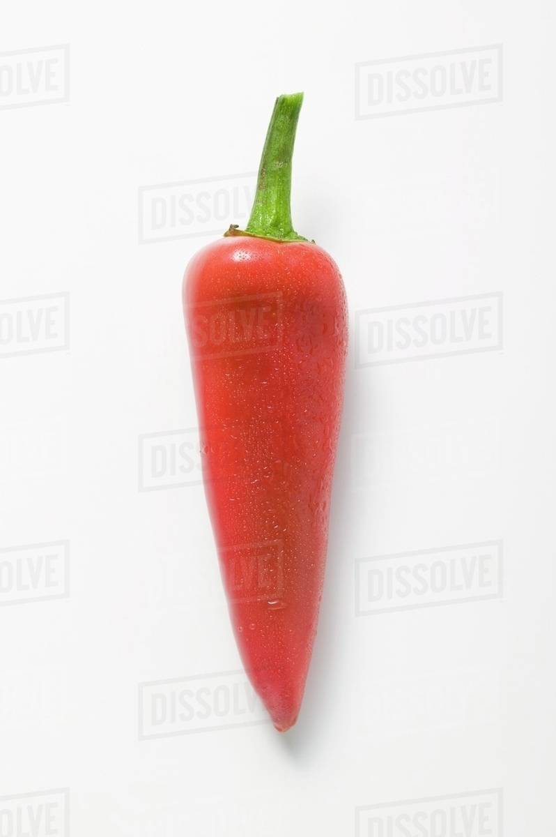 Red chilli with drops of water - Royalty-free Stock Photo | Dissolve