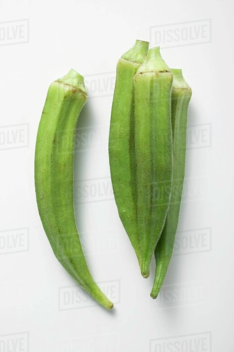 Four okra pods - Royalty-free Stock Photo | Dissolve