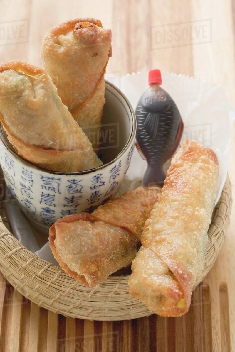 Crispy spring rolls with soy sauce to take away (Asia) - Stock Photo ...