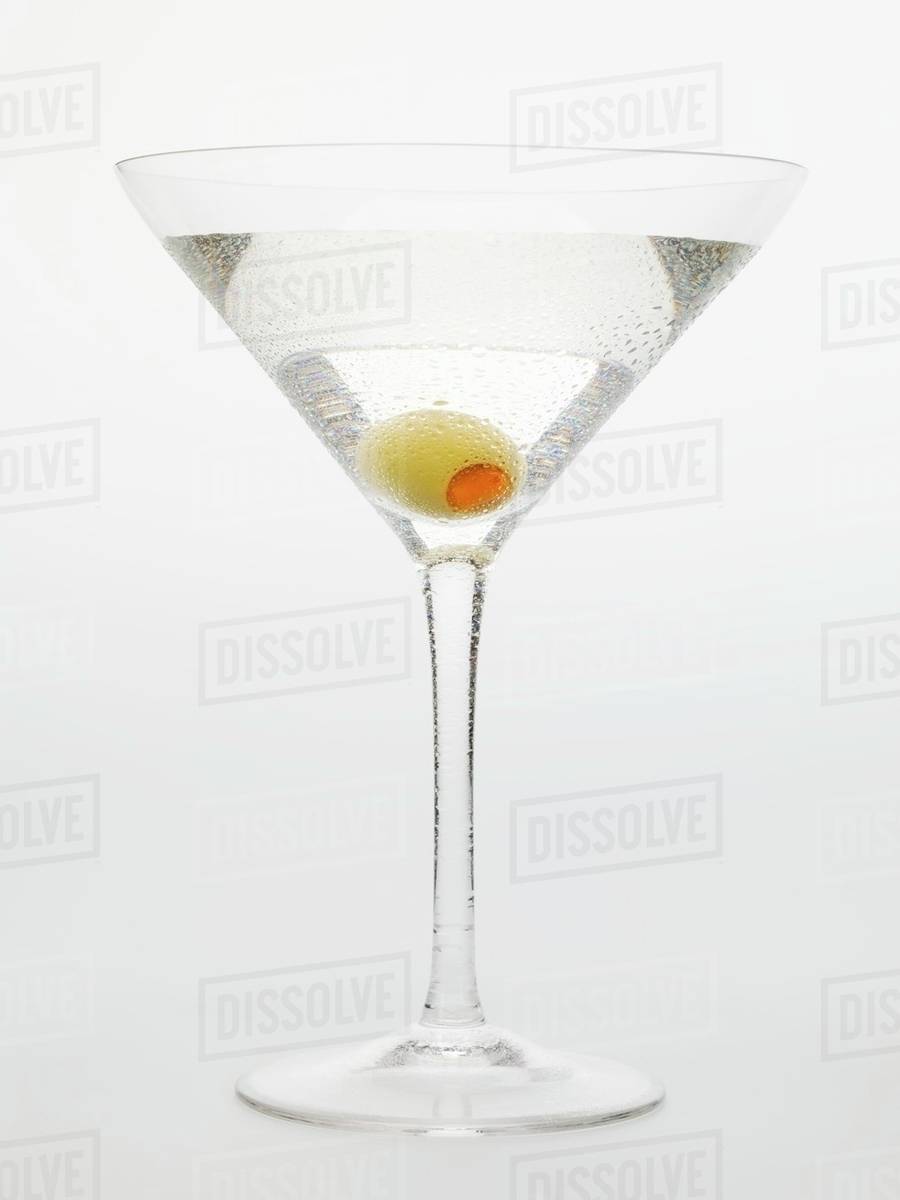 Martini with green olive - Royalty-free Stock Photo | Dissolve