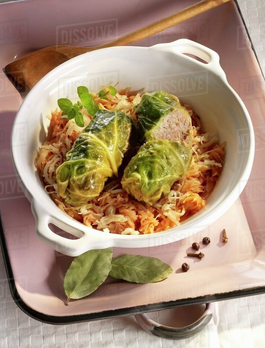 Savoy cabbage roulade with sauerkraut - Royalty-free Stock Photo | Dissolve