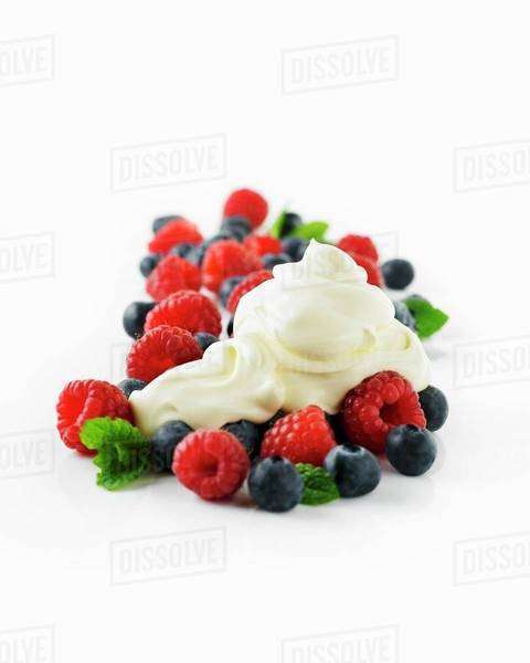 Crème fraîche with fresh berries - Royalty-free Stock Photo | Dissolve