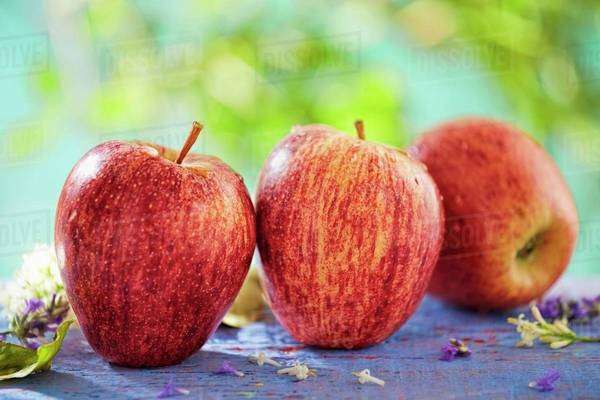 Three red apples - Royalty-free Stock Photo | Dissolve
