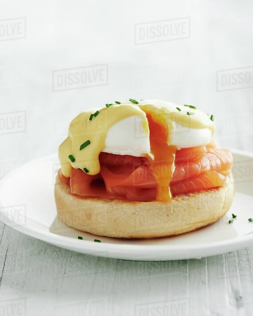 Egg Royale (a roll topped with smoked salmon and a poached egg) - Stock ...