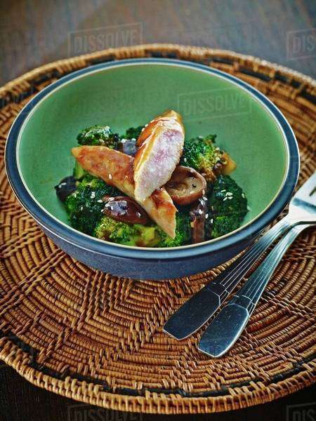 Glazed rabbit fillet on a broccoli and mushroom medley - Royalty-free ...