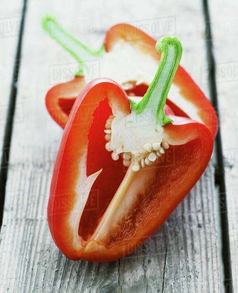 A halved red pepper - Royalty-free Stock Photo | Dissolve