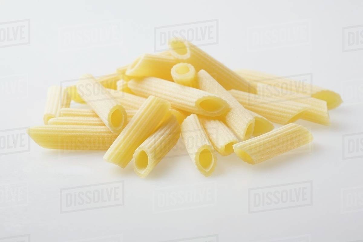 A pile of fresh Penne Rigate pasta - Royalty-free Stock Photo | Dissolve