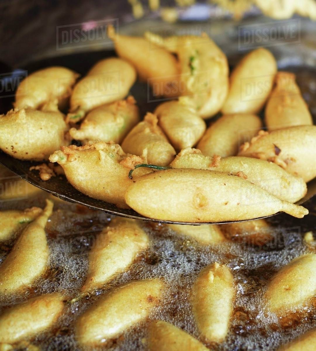 Battered chilli peppers - Royalty-free Stock Photo | Dissolve