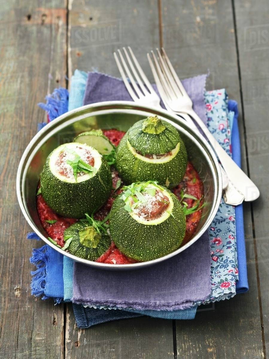 Round courgettes with minced meat filling in tomato sauce - Royalty ...